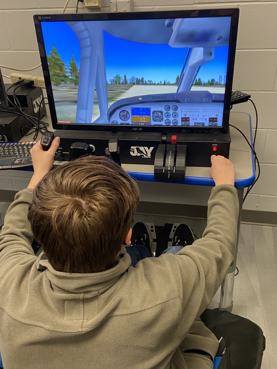 Aerospace Students Fly Red Bird Simulators - Career and Technical ...